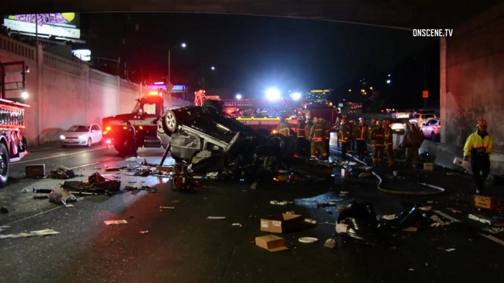 Two dead as van topples off Hollywood Freeway overpass onto car below ...